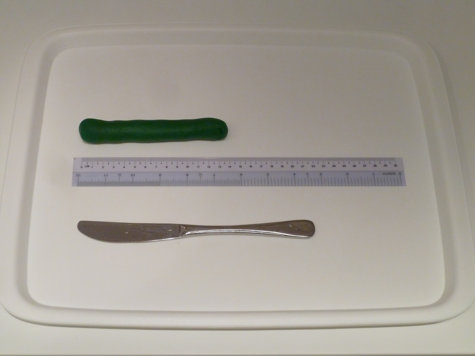 Family FECS: Montessori Activity: Measuring Playdough with Ruler