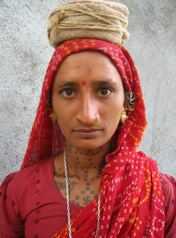 Local style: Women tattooing in India Local style: Women tattooing in India