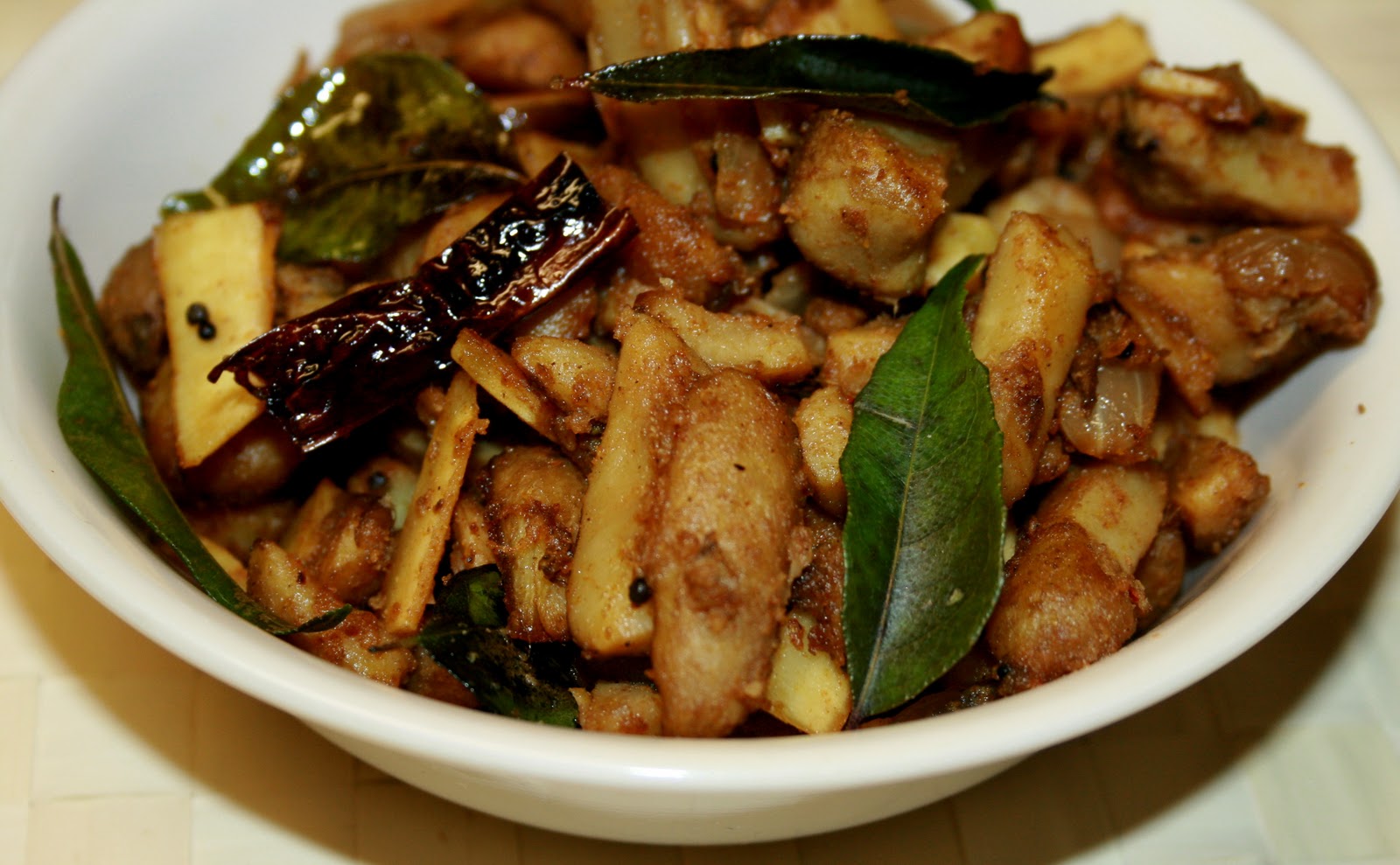 Third Kitchen: Koorka mezhukkupuratti (Chinese potato-stir fry)