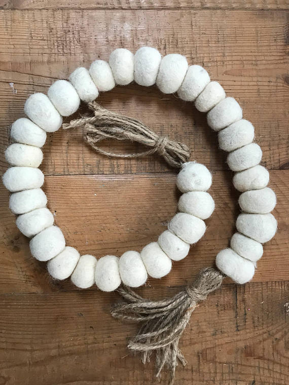 A Felted Wool Bead Garland from Homeroad - Organized Clutter