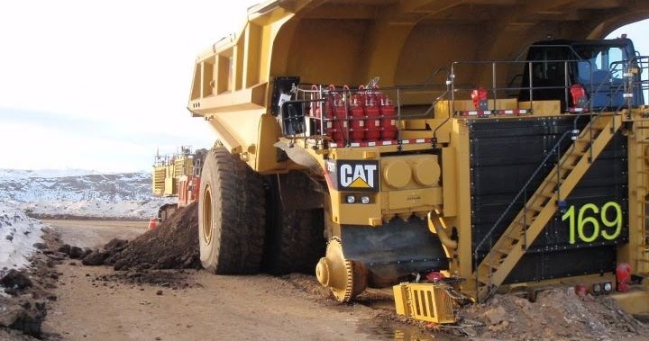 Mining Mayhem: Cat 797 Wheel Off