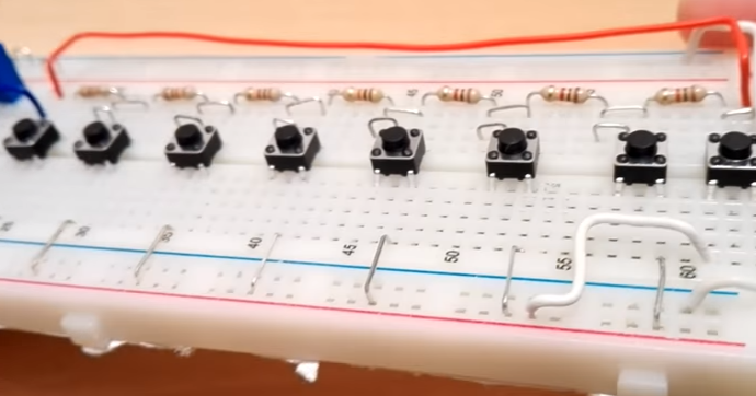 first year project Electronic Piano using 555 Timer IC with breadboard ...