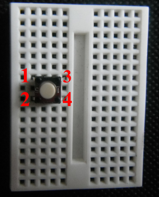 Vikipedia Electronics Lab: Connecting a switch to a microcontroller