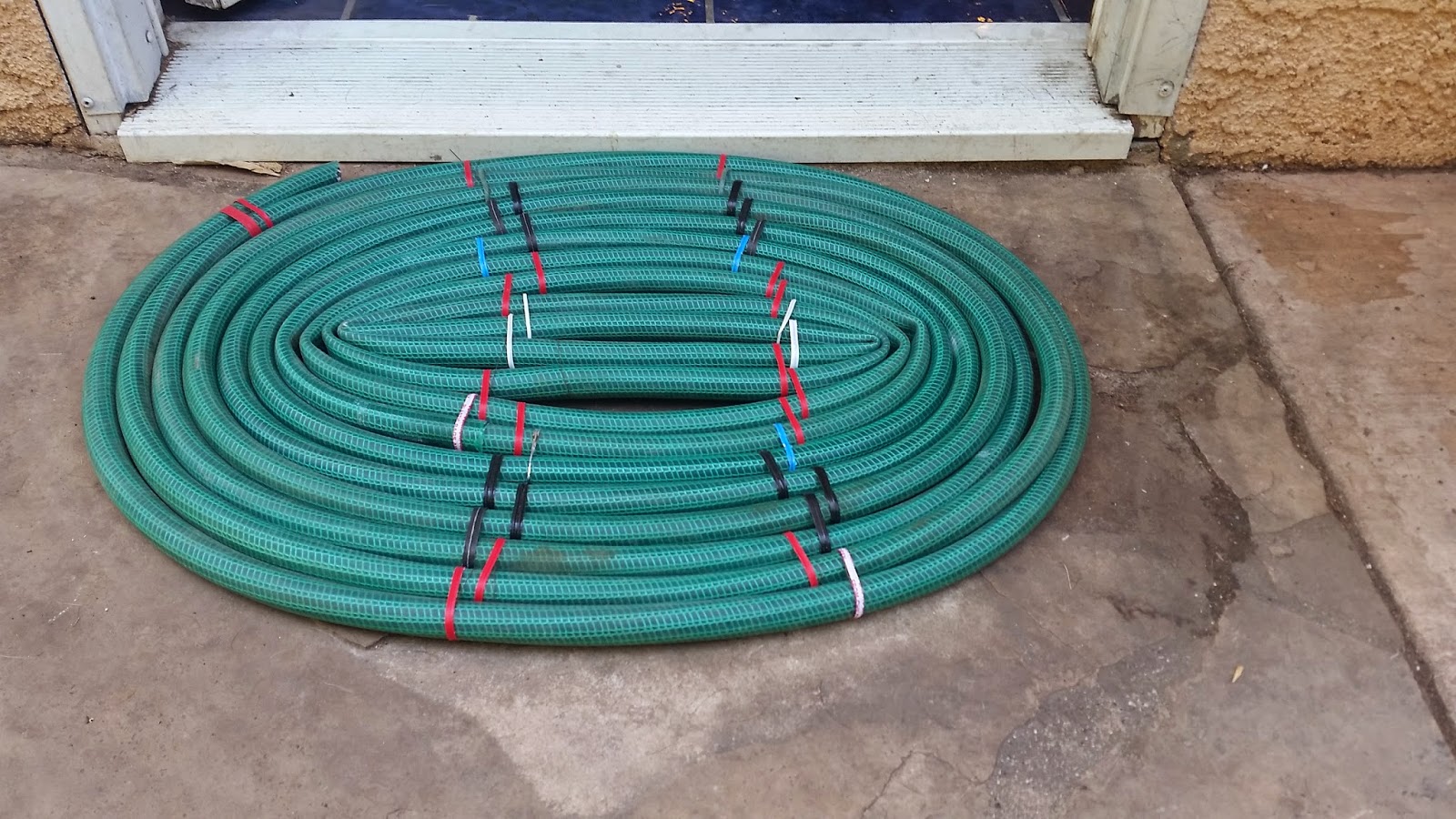 Frugal Garden Girl: Garden Hose Door Mat