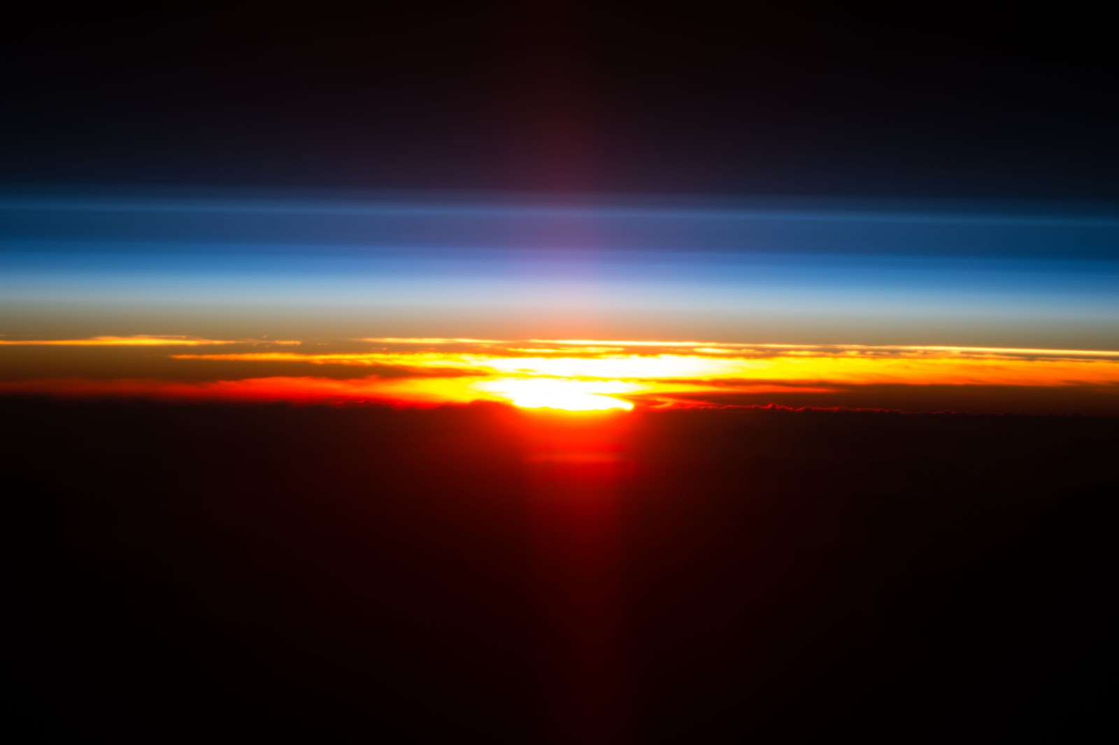 Earth's Atmosphere and Sunrise over Pacific Ocean seen from the ...