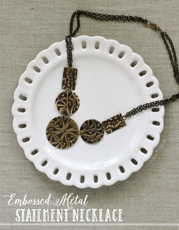 PitterAndGlink: Embossed Metal Statement Necklace