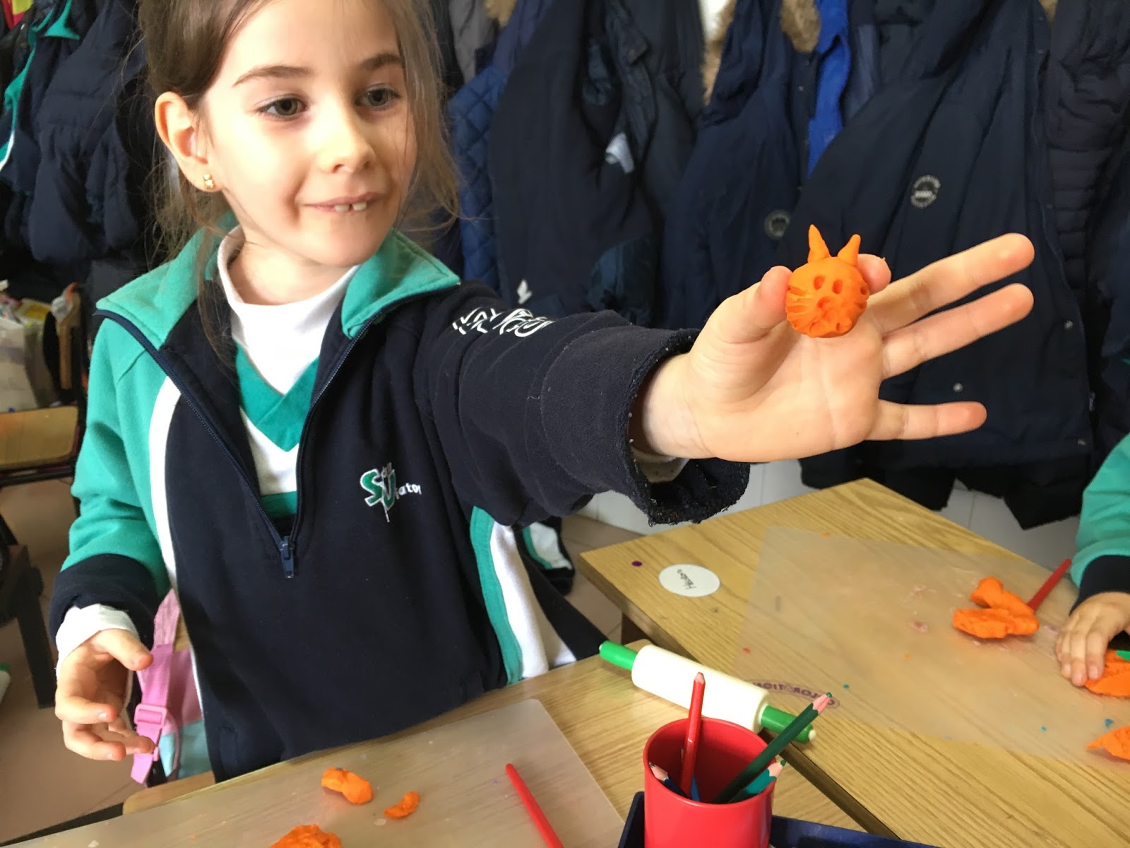 Learning and growing together.: Creating plasticine sculptures!