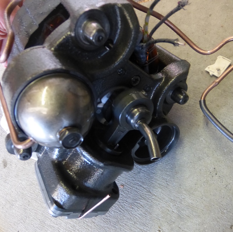 Taking Apart a Refrigerator Compressor | Greens and Machines