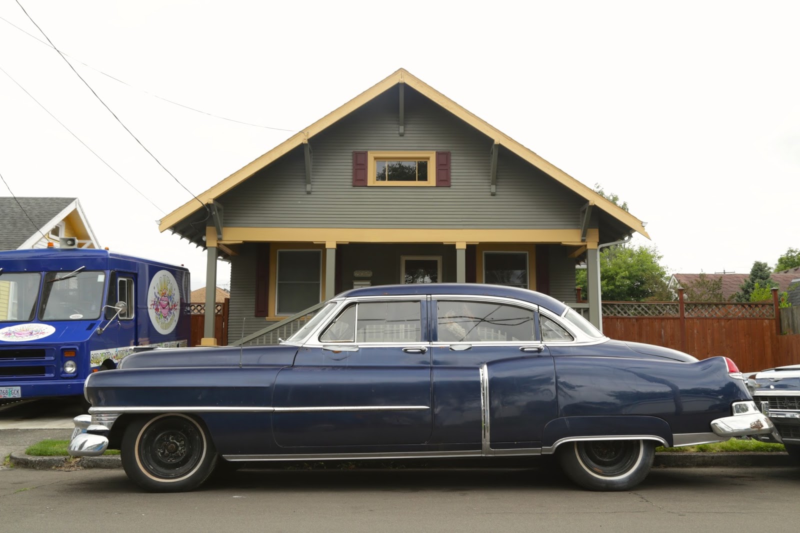 OLD PARKED CARS.: 1950 Cadillac Sedan De Ville.