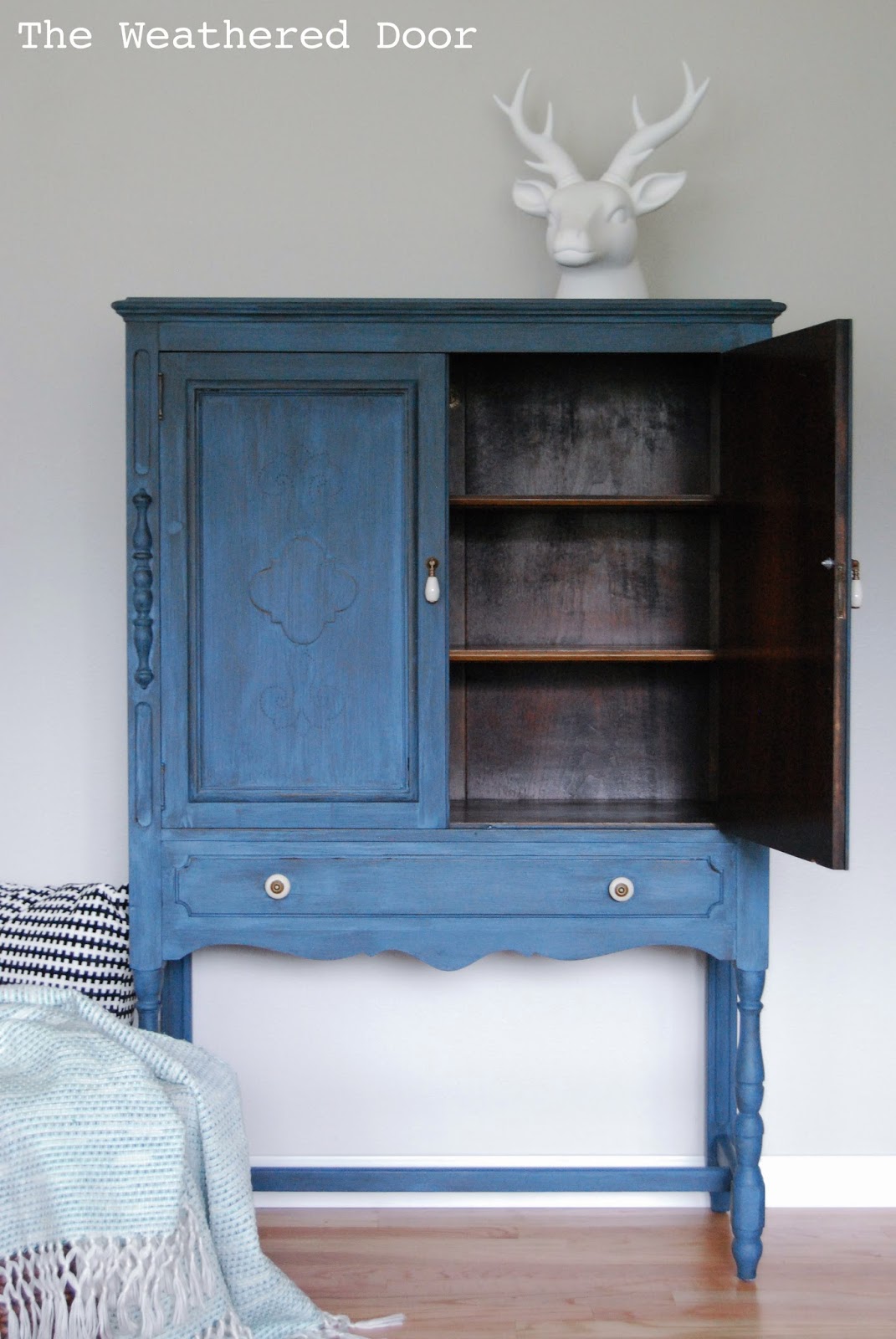A deep blue milk paint cabinet - The Weathered Door