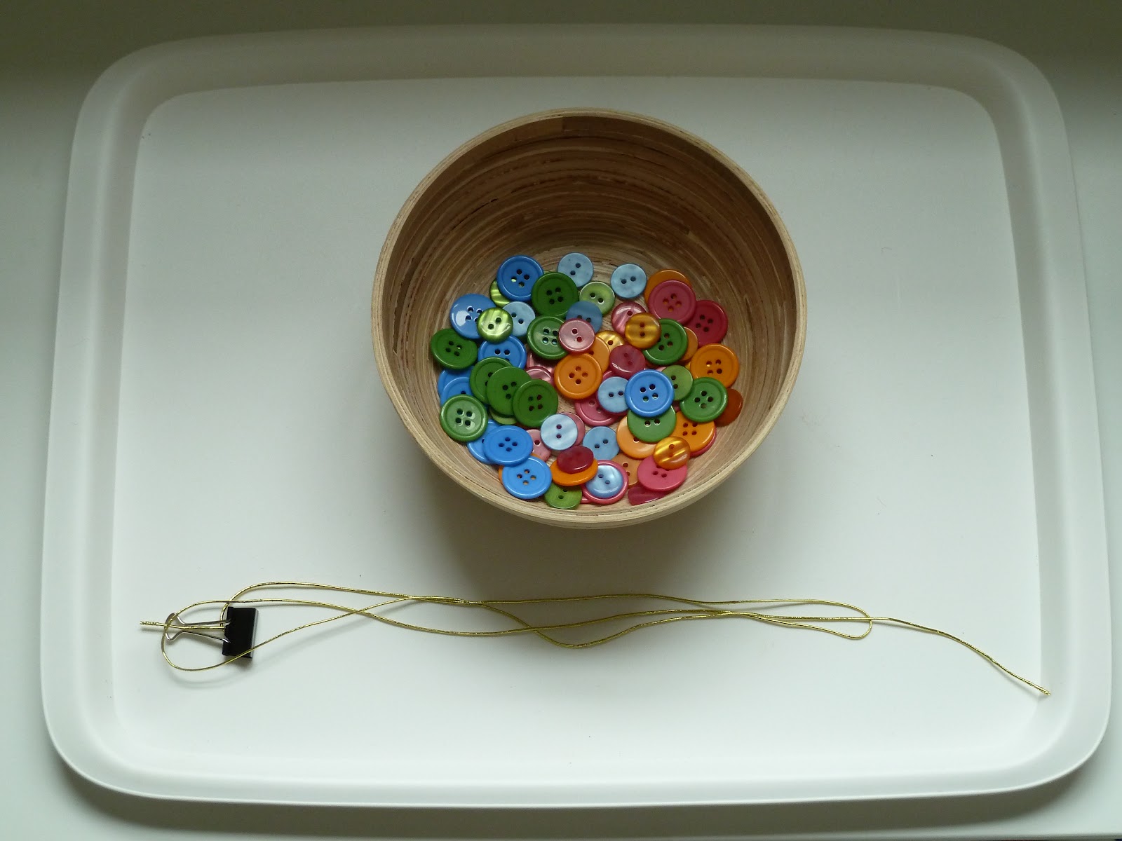 Family FECS: Montessori Activity: Stringing Buttons