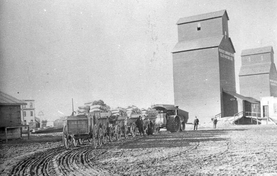 Industrial History: After steam tractor runs thresher, it hauls grain ...