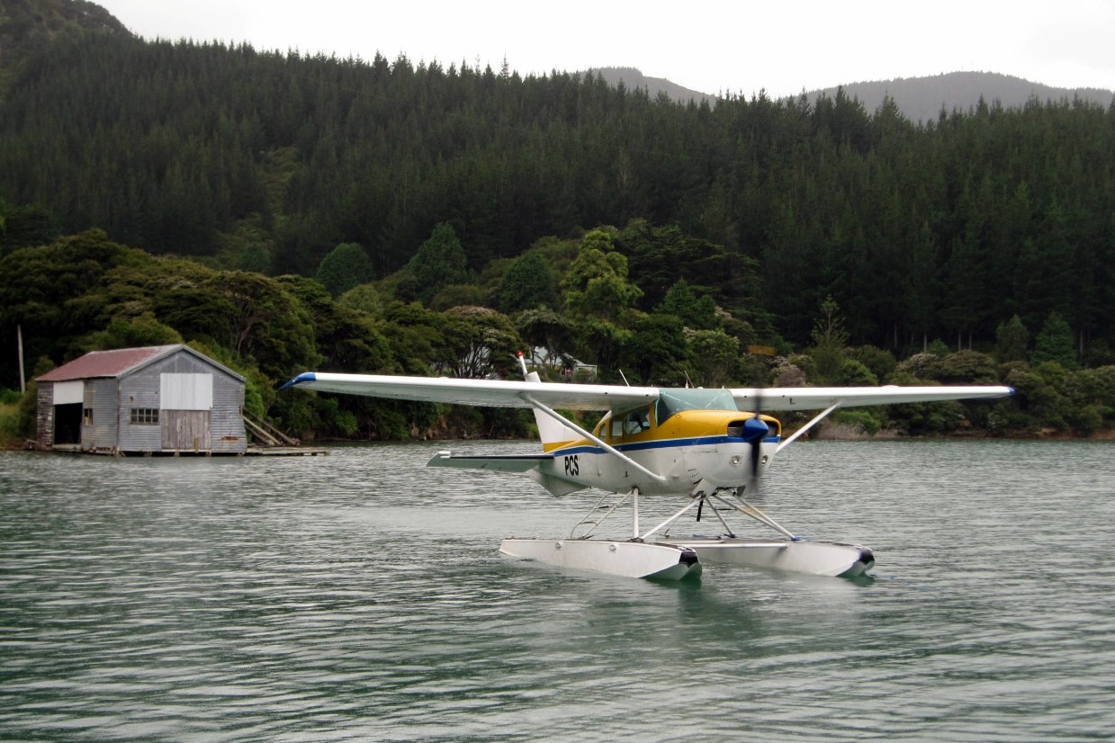 NZ Civil Aircraft: Cessna 206 Floatplane ZK-PCS Making a Living