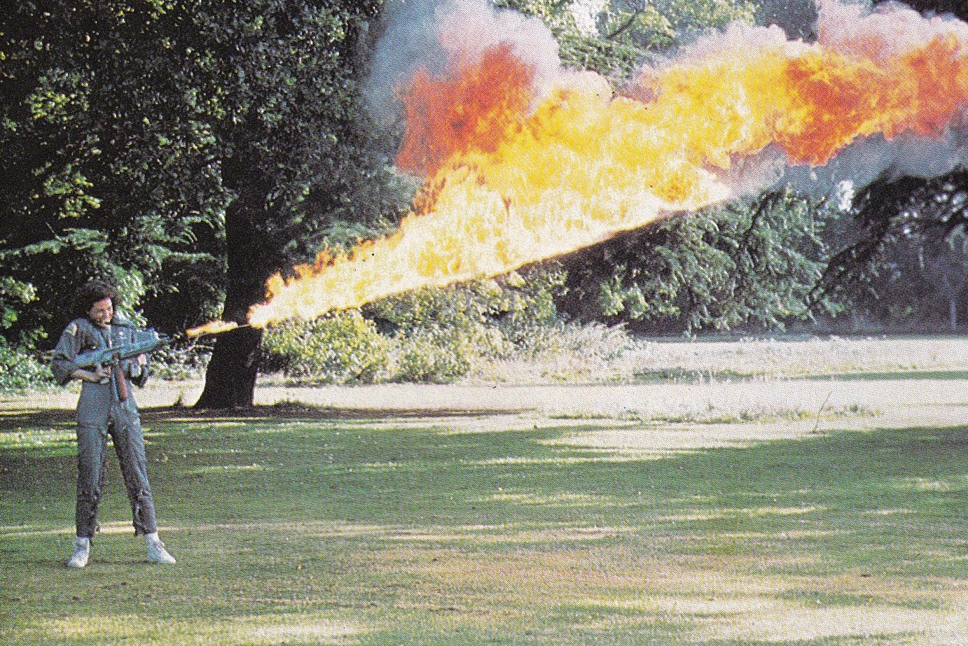 Sigourney Weaver shooting a flamethrower in a park. : r/pics