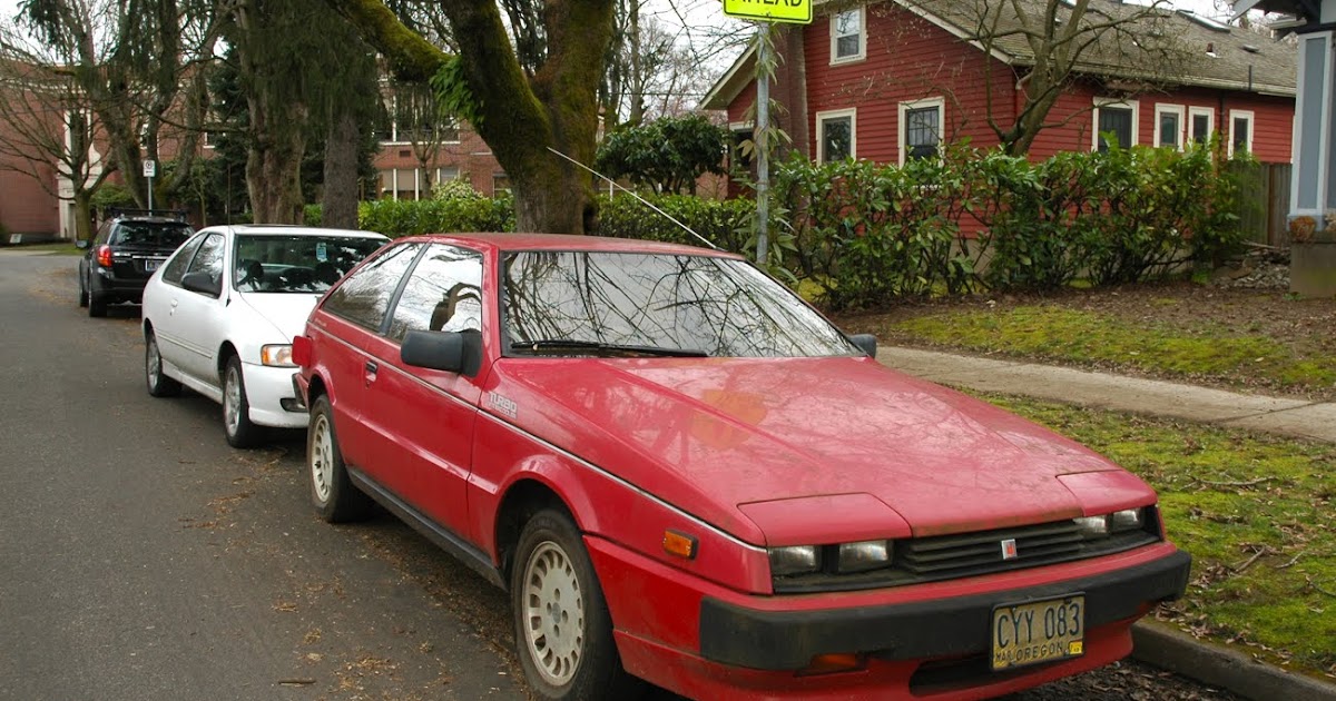 OLD PARKED CARS.: 1985 Isuzu Impulse Turbo.