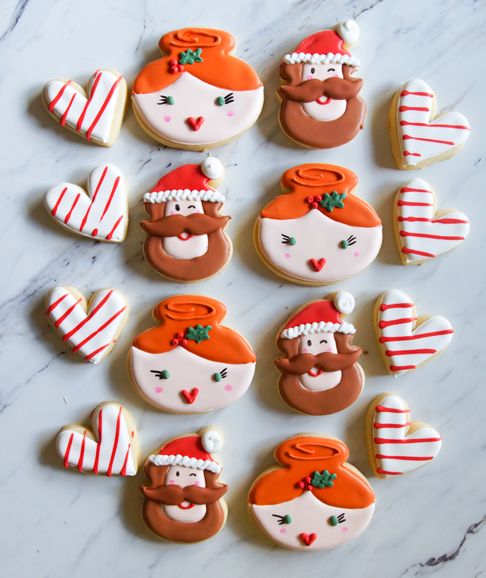 Newlywed Santa and Mrs. Claus Cookies | Bake at 350°