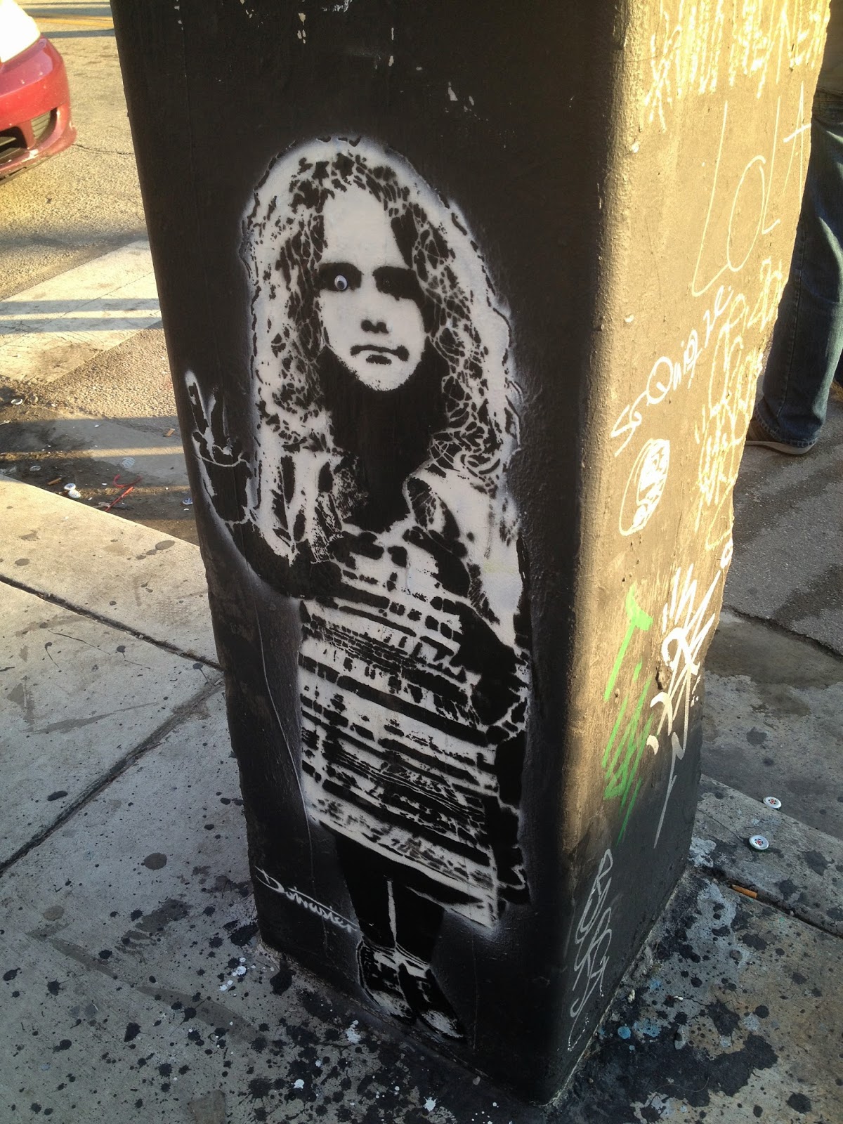 Sidewalk Stencil Graffiti in Wynwood: Miami's Art and Design District