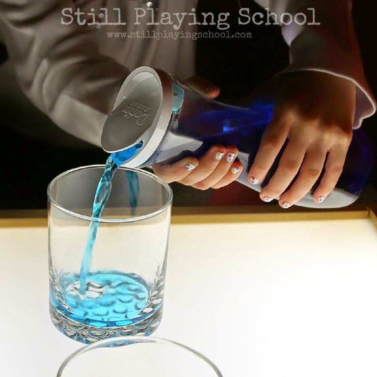 Scoop and Pour Serving Practice on the Light Table | Still Playing School