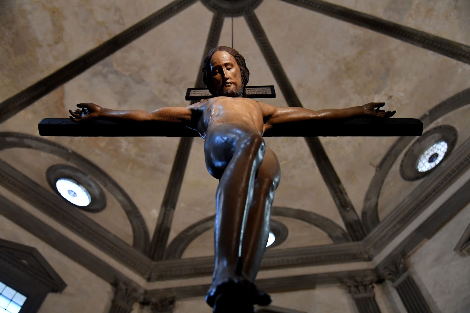 Restored Michelangelo crucifix gets pride of place at Santo Spirito ...
