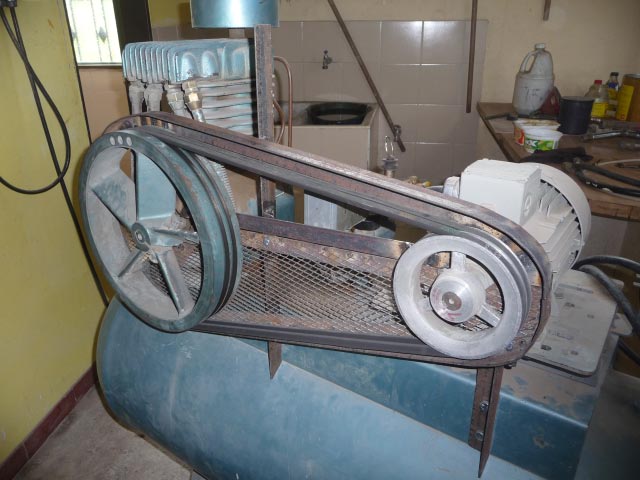Granja Peniel Workshop: Fabricating a belt guard for the compressor