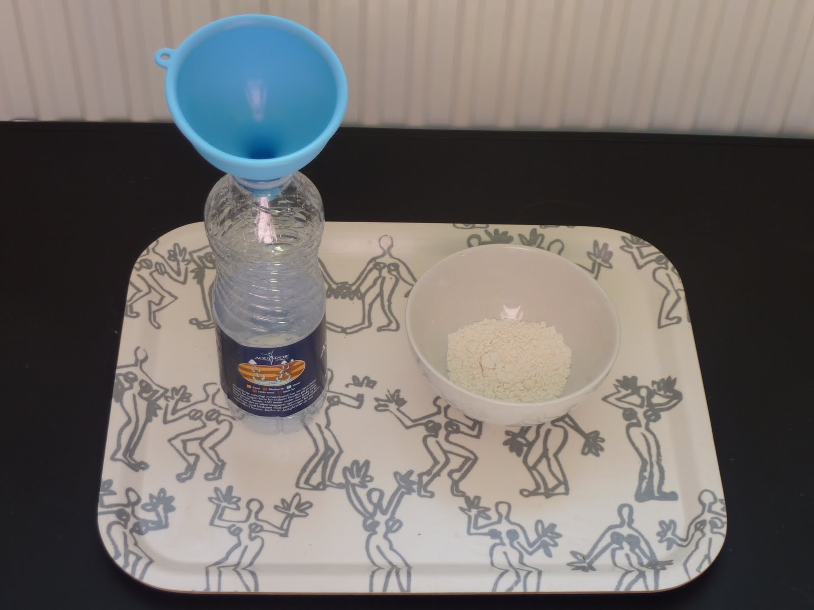 Family FECS: Montessori Activity: Funneling Flour