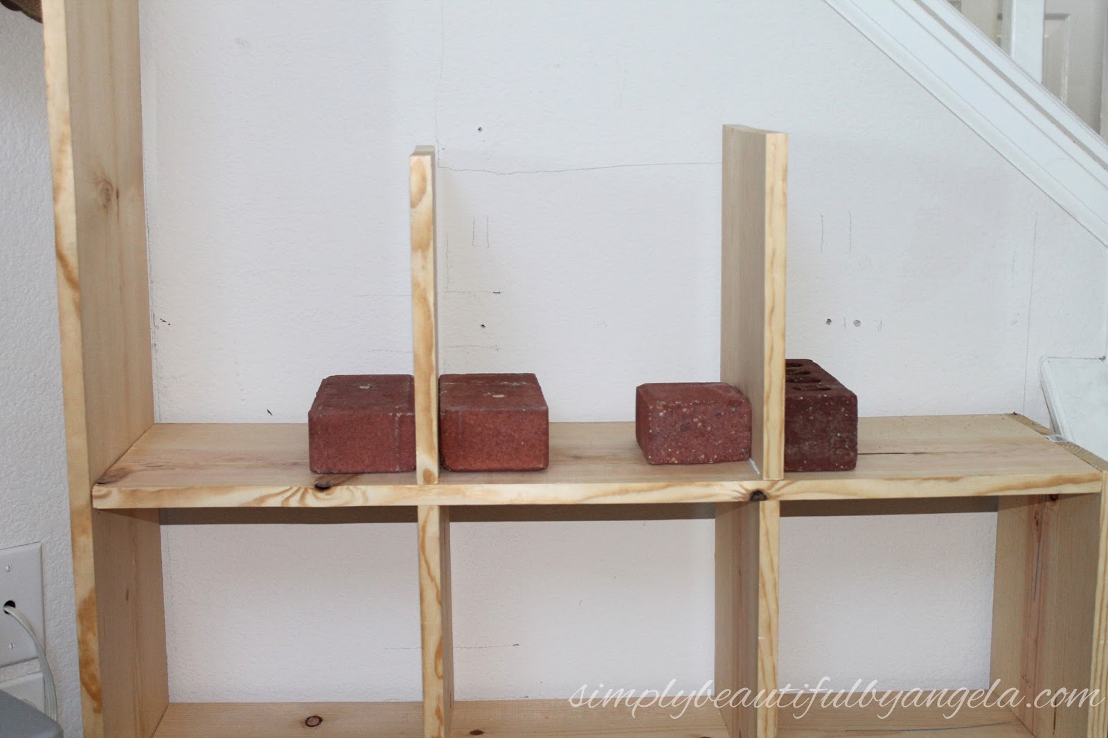 DIY Staircase Storage Unit for Living Room Toys
