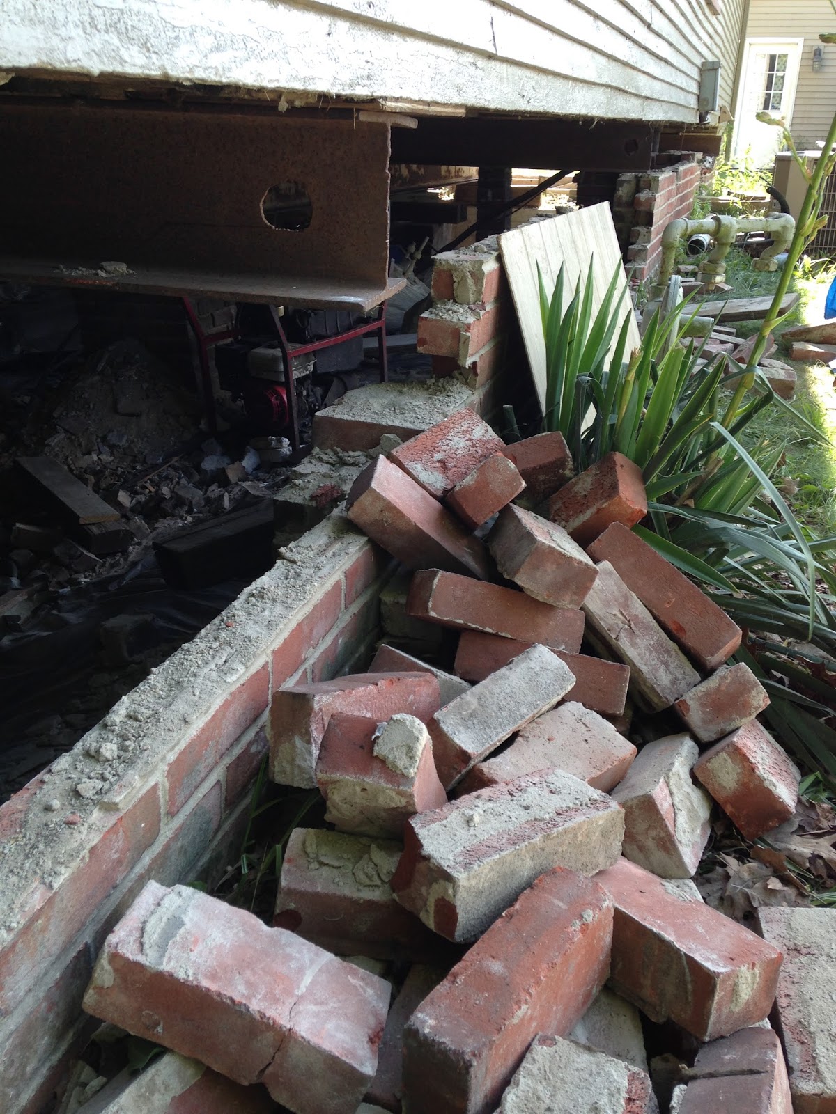 Moving To 501: Salvaging Bricks. Brick by brick by brick.....