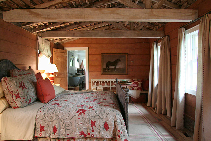 Rustic elegant bedroom in Barn conversion home by Carrier and Company