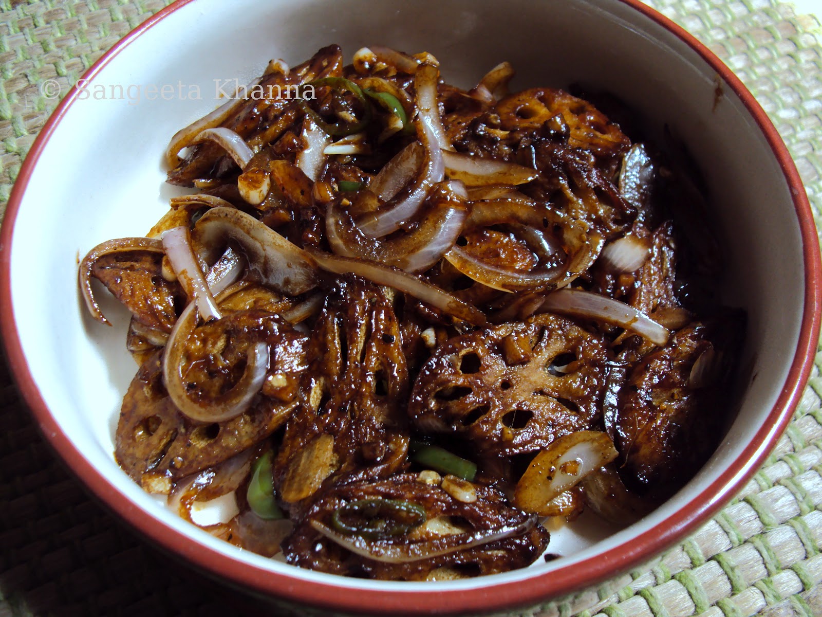 lotus stem stir fried in a sweet n sour sauce