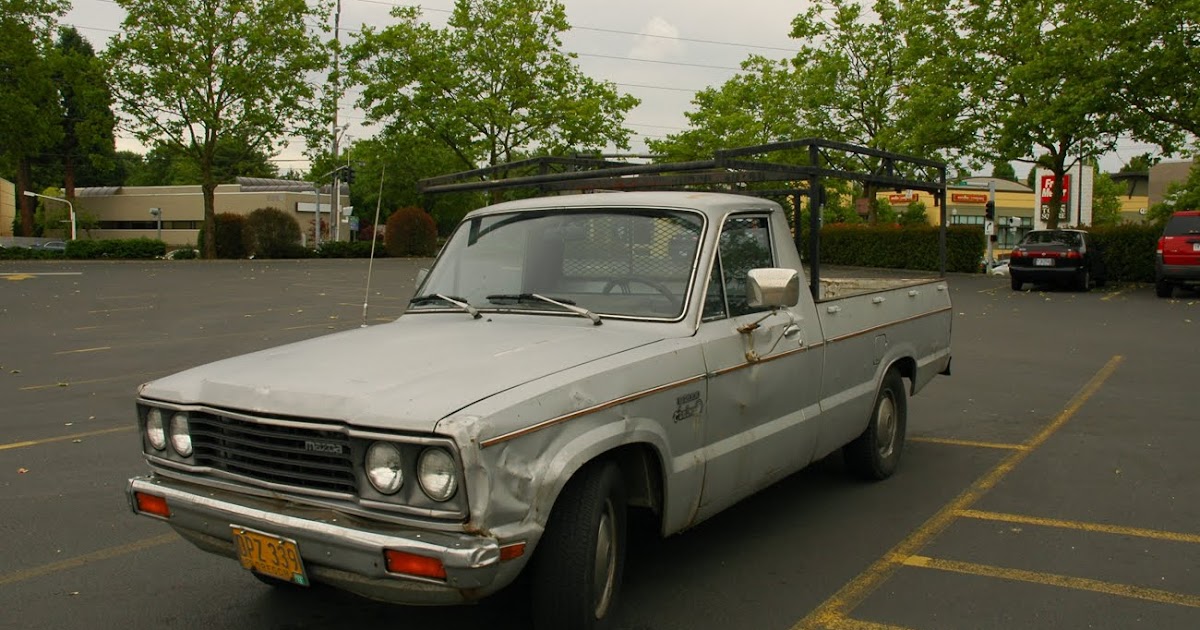 OLD PARKED CARS.: 1980 Mazda Sundowner.