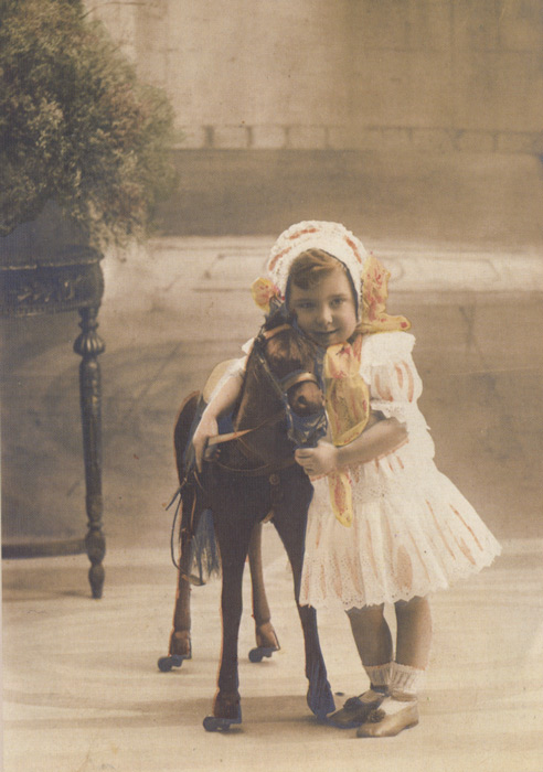 Old Fashioned Kids With Large Toy Horses | sweet juniper inspiration