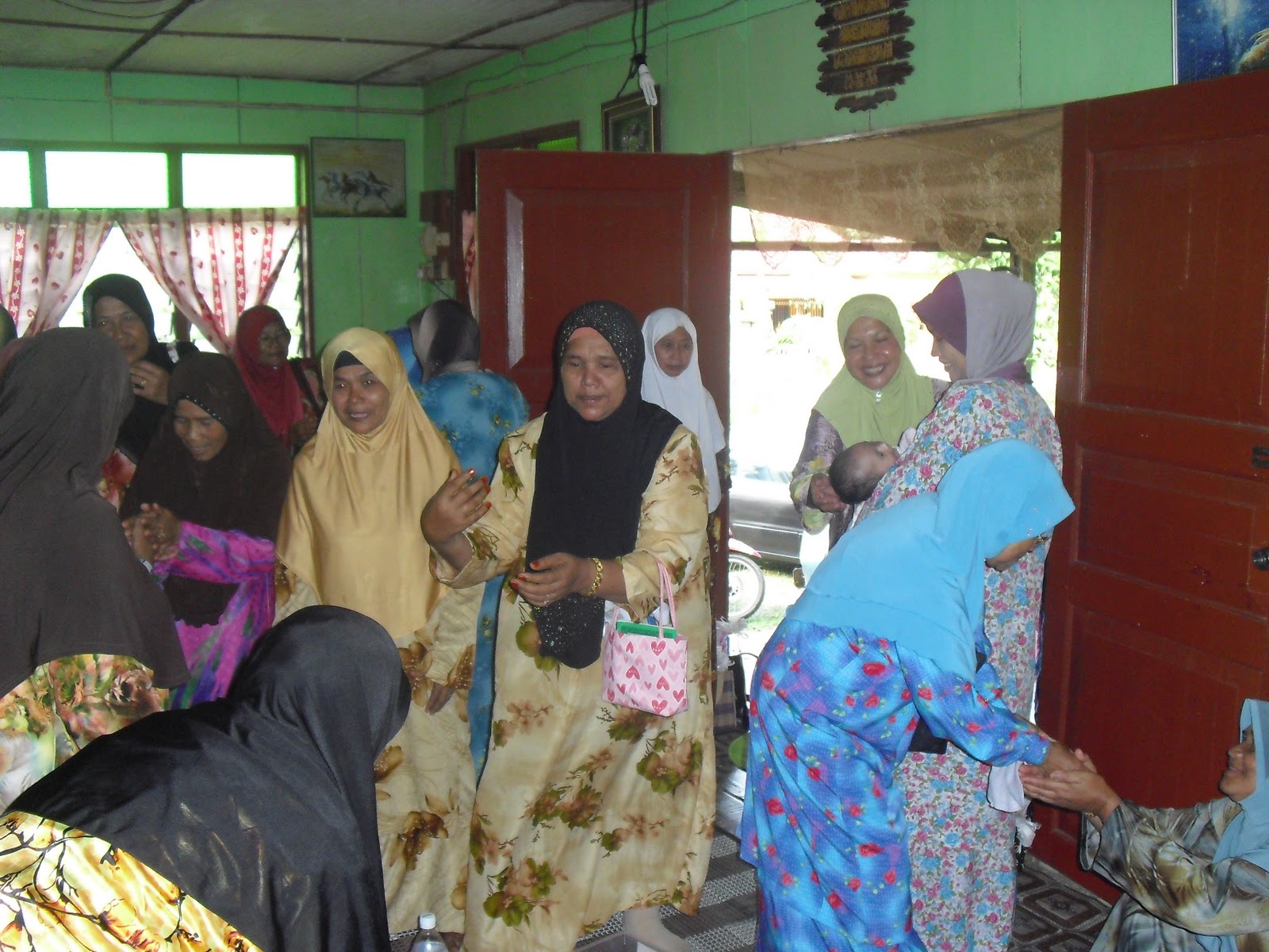 Sang Pemerhati: The 'Potong Jambul' ceremony
