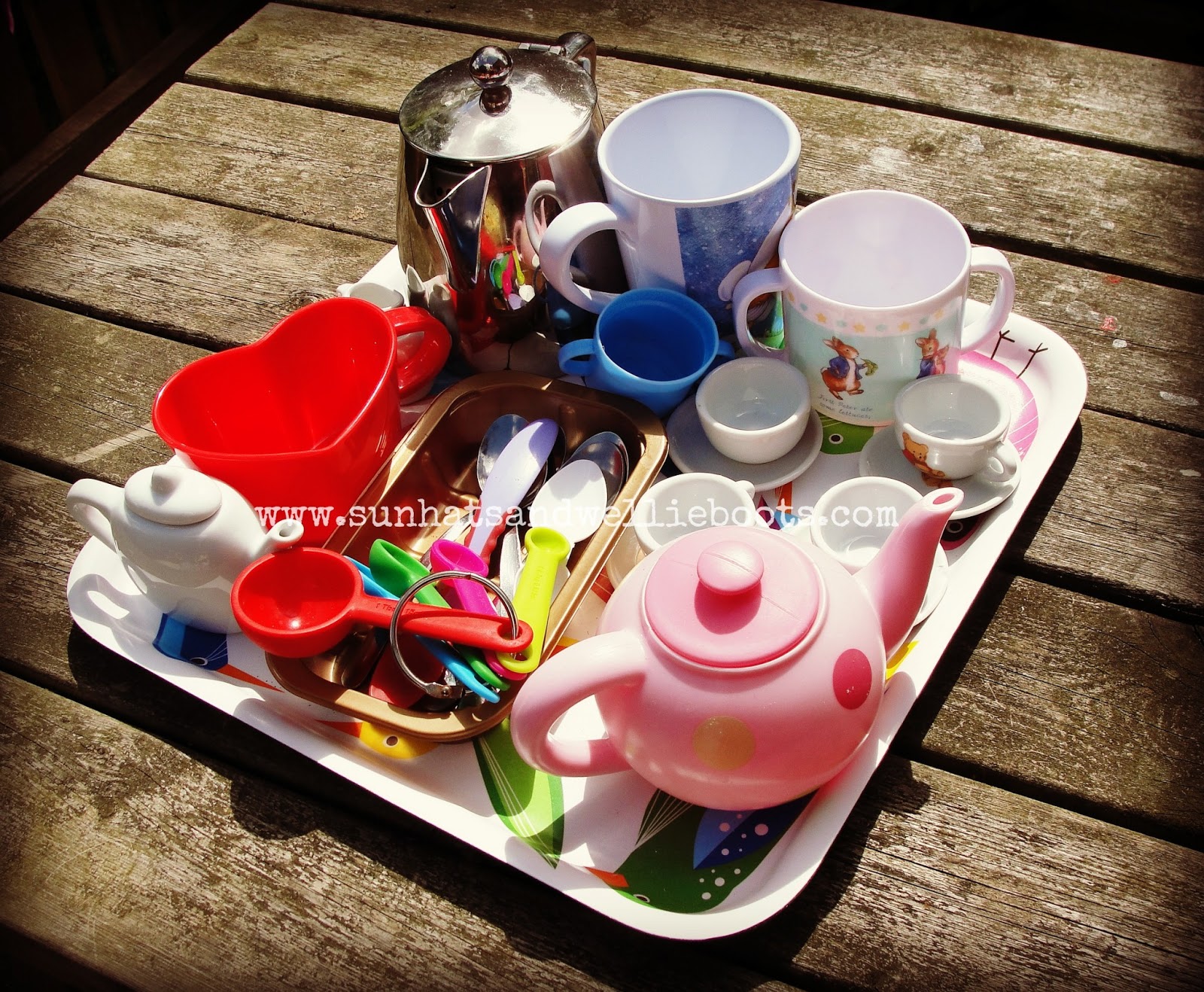 Sun Hats & Wellie Boots: Pouring & Transferring Play with Tea