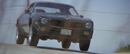 CINEMATIC REVELATIONS: FILM REVIEW OF "MCQ" (1974)