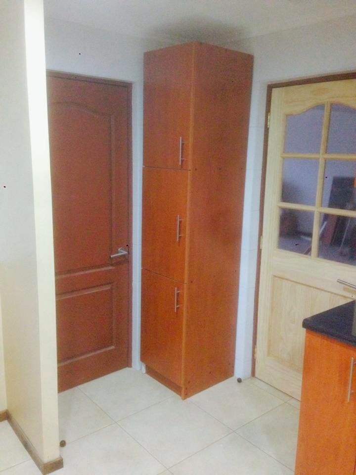 Centro de Proyectos A-Medida: Cocina color Peral