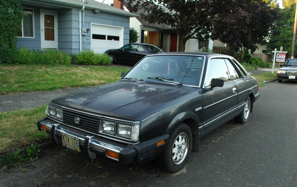 OLD PARKED CARS.: 1982 Subaru GLF Coupe.