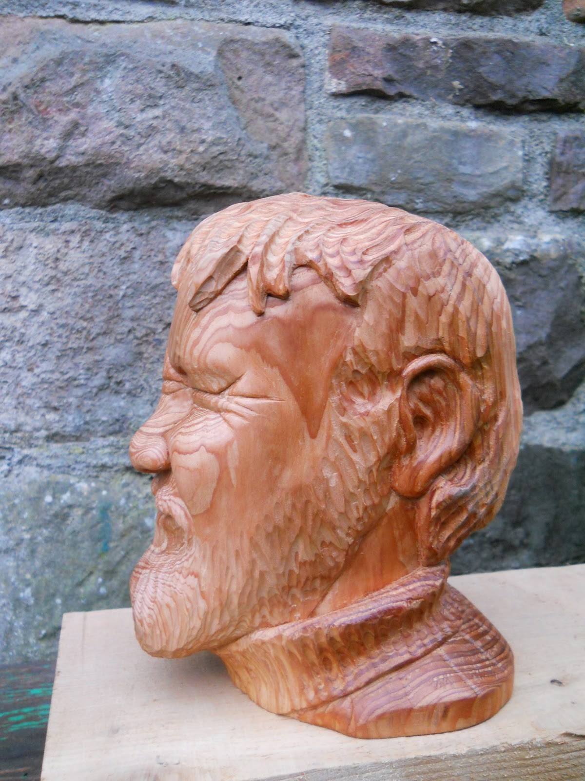 Carving a self portrait in wood for 'Cornucopia' at the Grant bradley ...