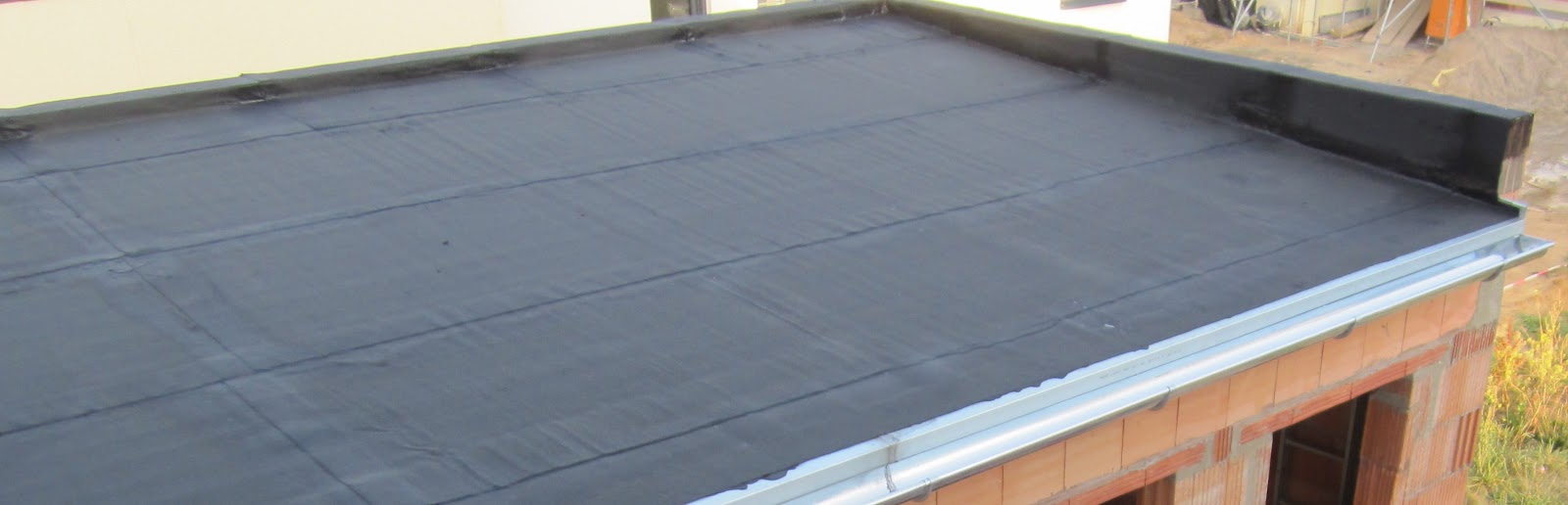 Unser Hausbau: Garage in Eigenleistung: 2. Lage Bitumenbahn angeschweißt