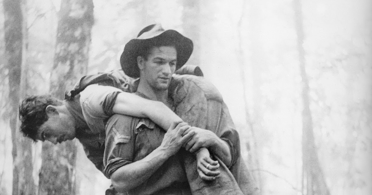 World War II Pictures In Details: Corporal Bull Allen Carrying Wounded ...
