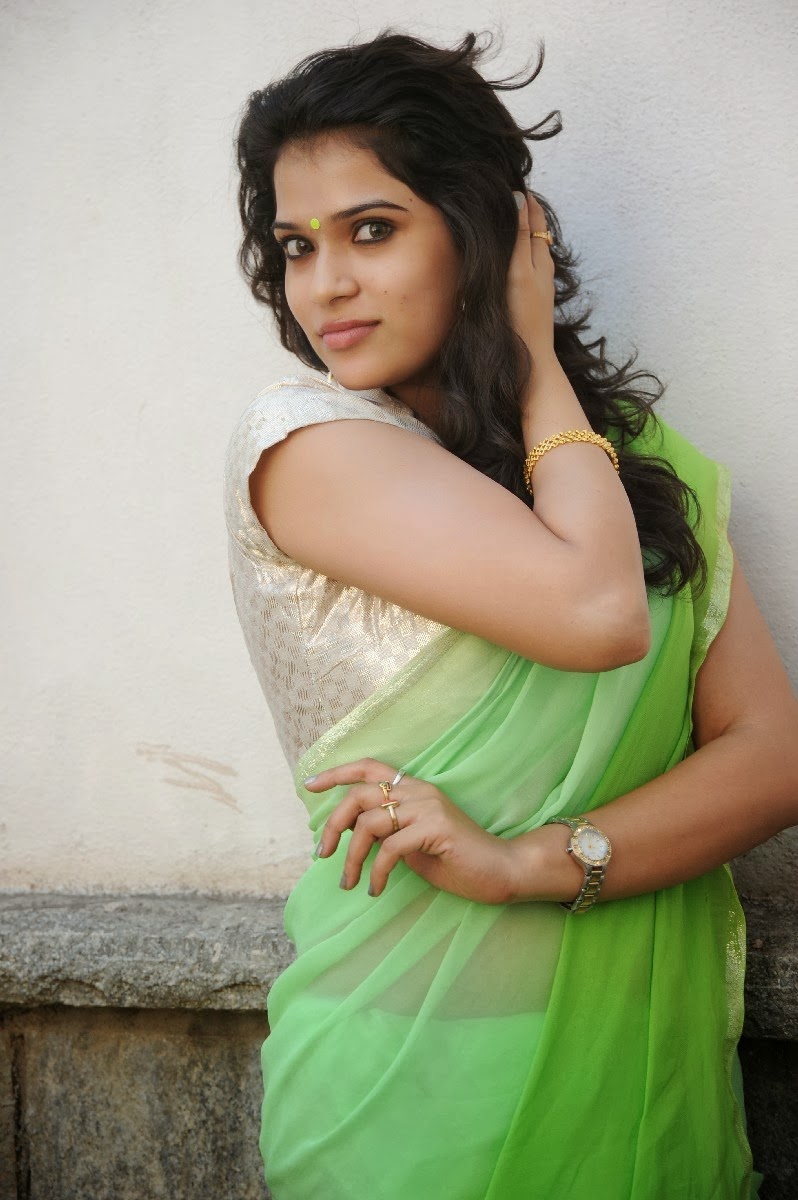 Actress Bhargavi in Green Saree Photos at LUB Press Meet Gallery