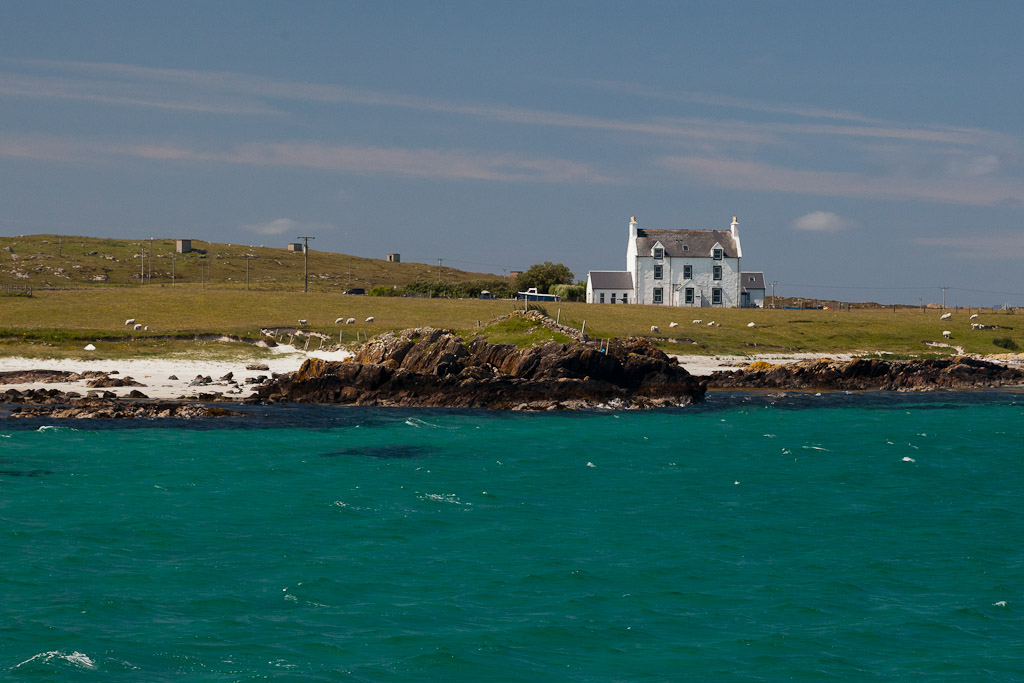 Sea kayaking with seakayakphoto.com: Well composed on Gott Bay pier, Tiree.