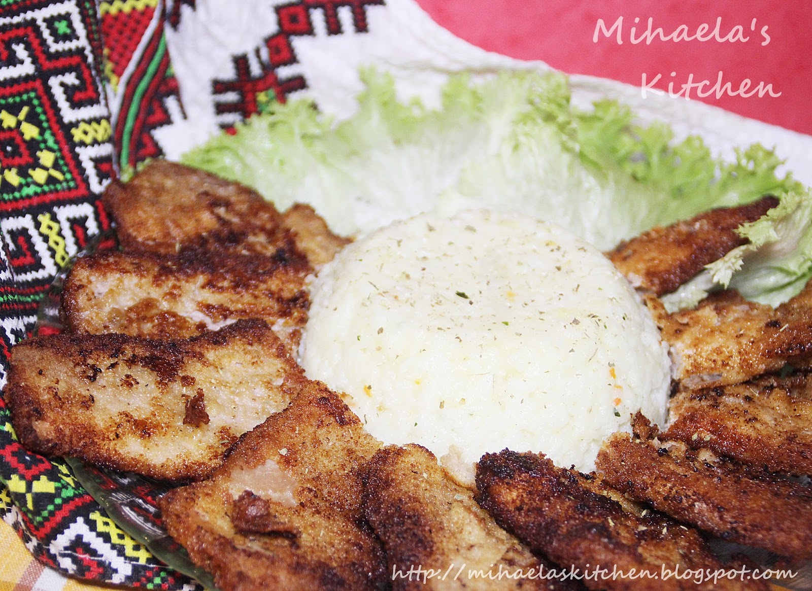 Snitele de porc cu garnitura de orez