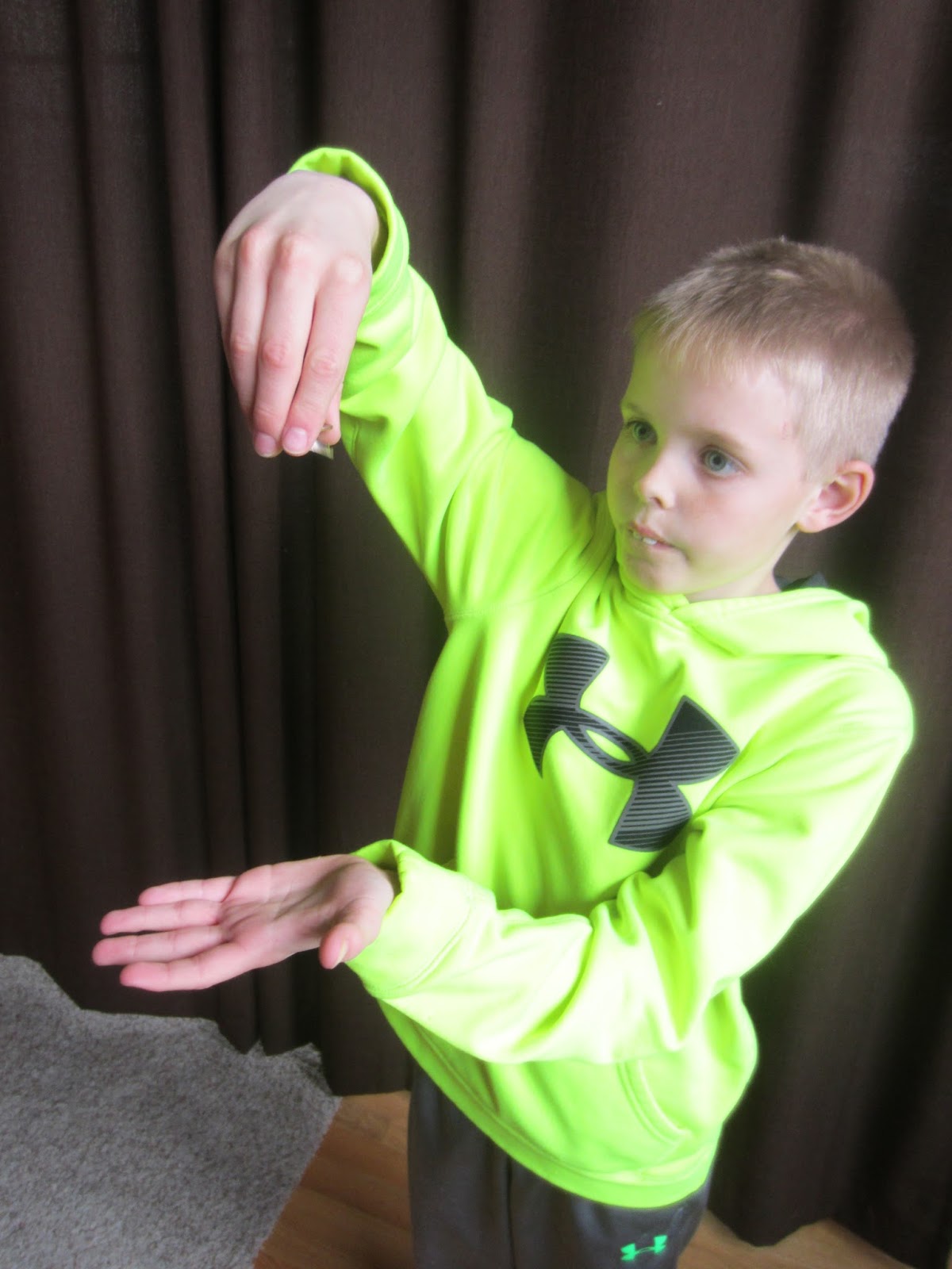 Relentlessly Fun, Deceptively Educational: Gravity-Defying Coin Trick