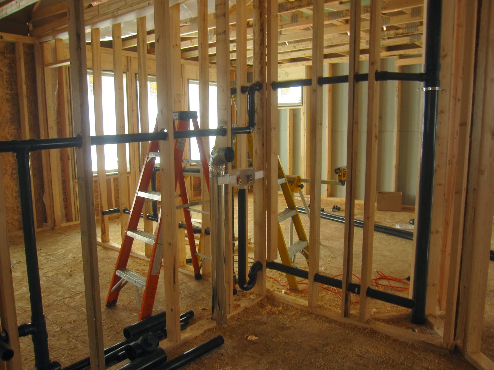 Building an infill in Westmount: roof done, garage started, plumbing ...