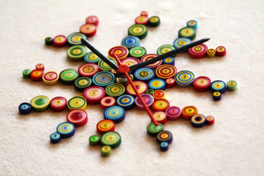 Maya Arts and Crafts: A clock with quilled art work