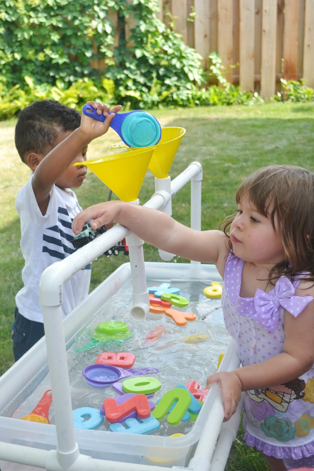 Our House in the Middle of Our Street: PVC Pipe Water Table