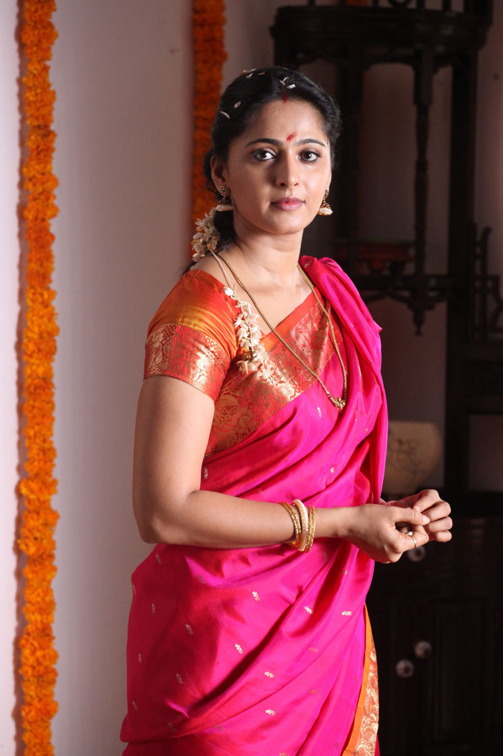 Indian Girl Anushka Shetty Long Hair Photos In Red Traditional Saree