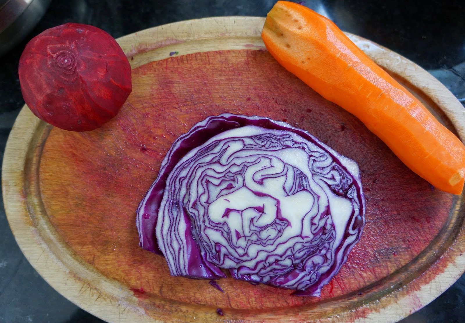 Raw beetroot, red cabbage and carrot salad