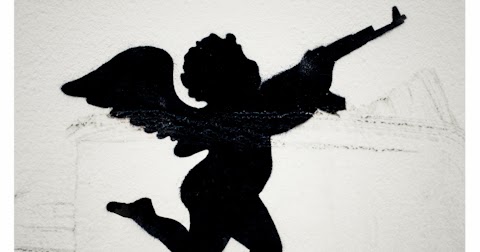 Pictures from Paris: Cupid - I think a machine gun is so much more ...