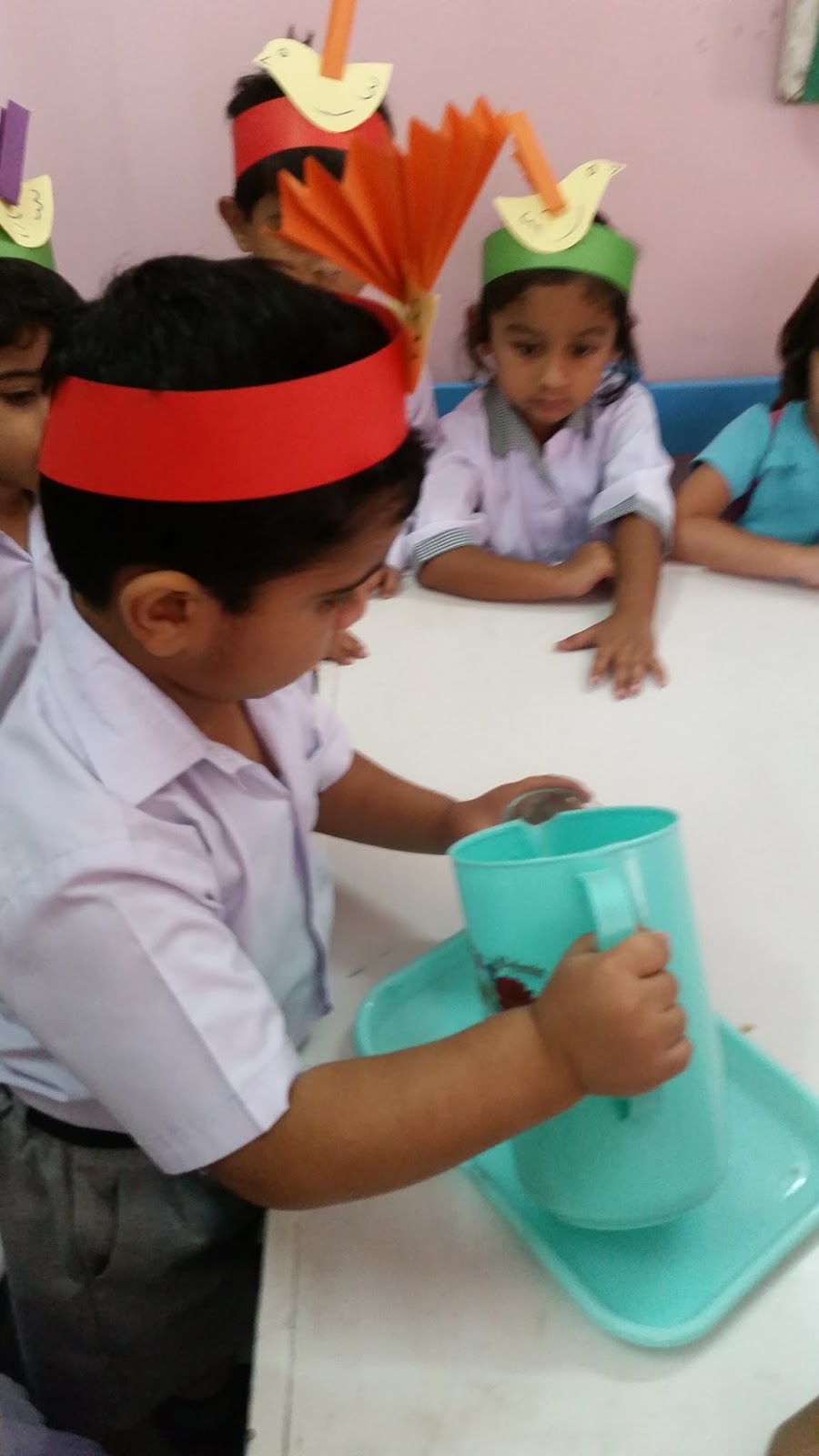 Red Little stars: EPL activity (water pouring and mopping activity)